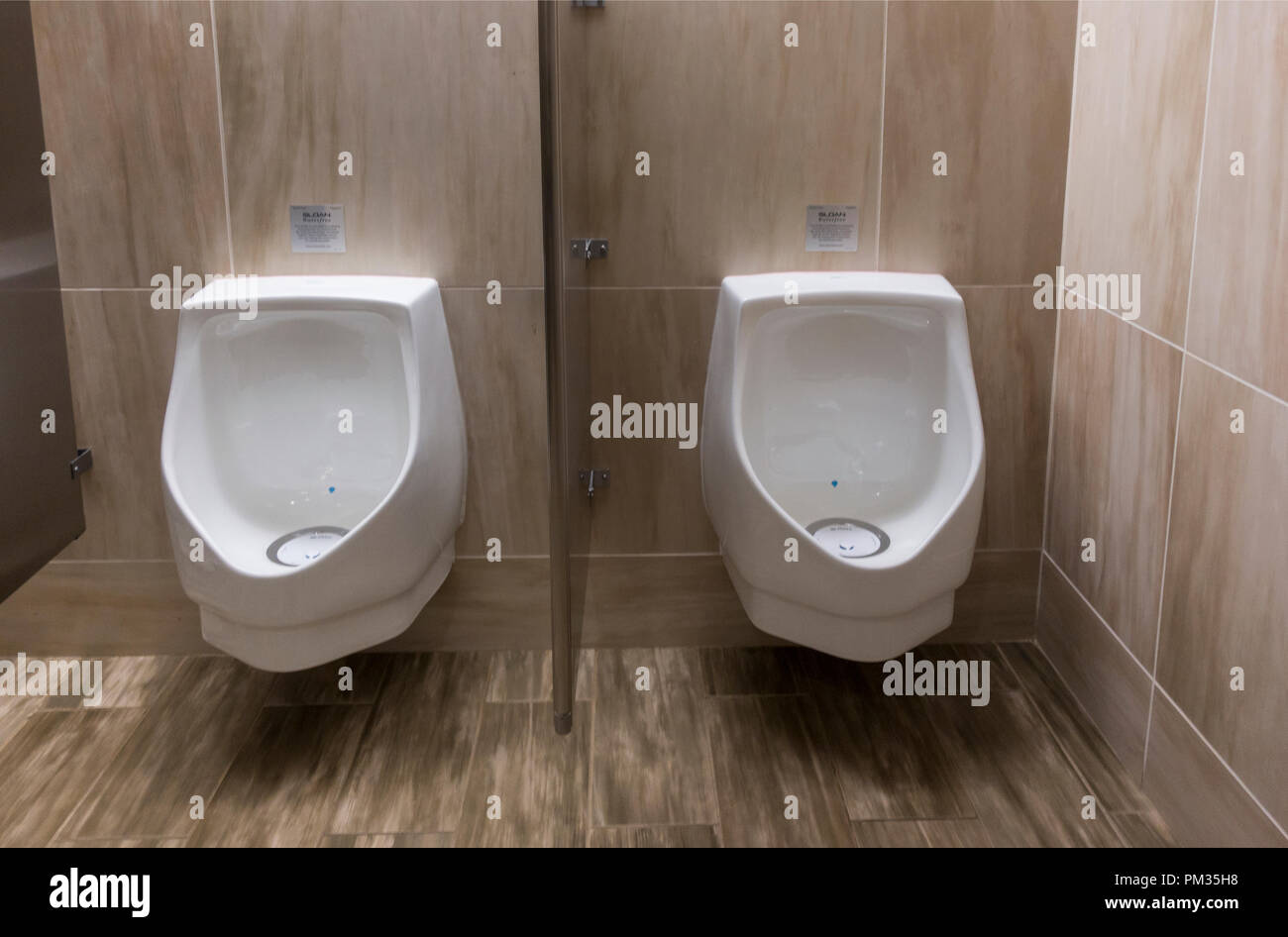 Mens bathroom stall hi-res stock photography and images - Alamy