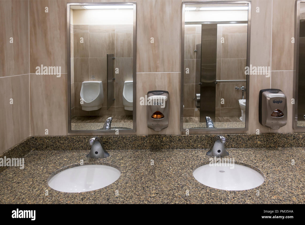 Men's restroom interior Stock Photo - Alamy