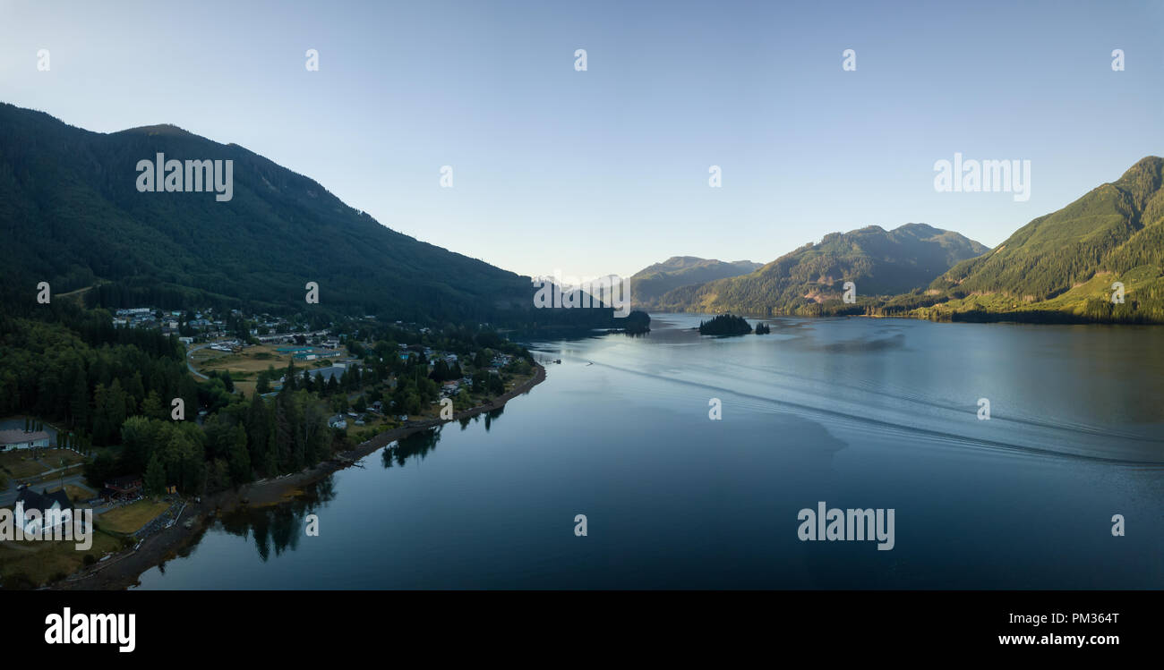 Aerial view of a small town, Port Alice, during a sunny summer sunrise ...