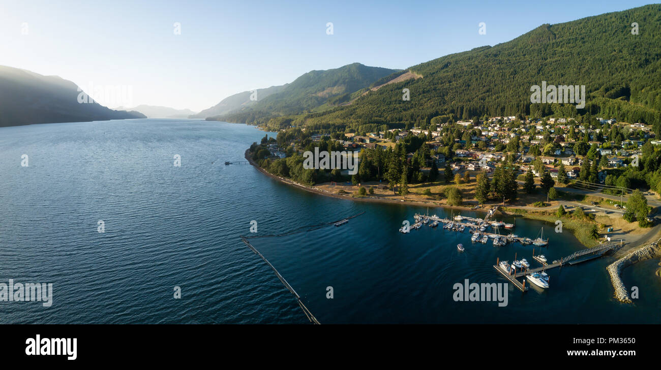 Aerial panoramic view of a small town, Port Alice, during a sunny ...