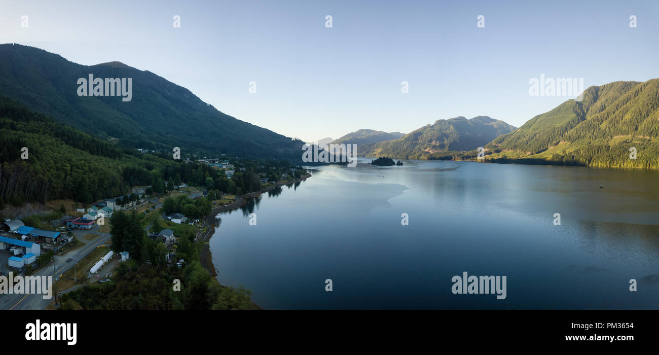 Aerial view of a small town, Port Alice, during a sunny summer sunrise ...