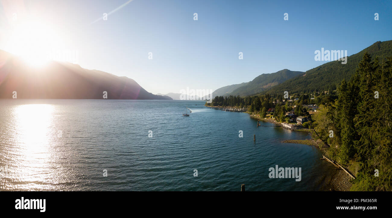 Aerial panoramic view of a small town, Port Alice, during a sunny ...
