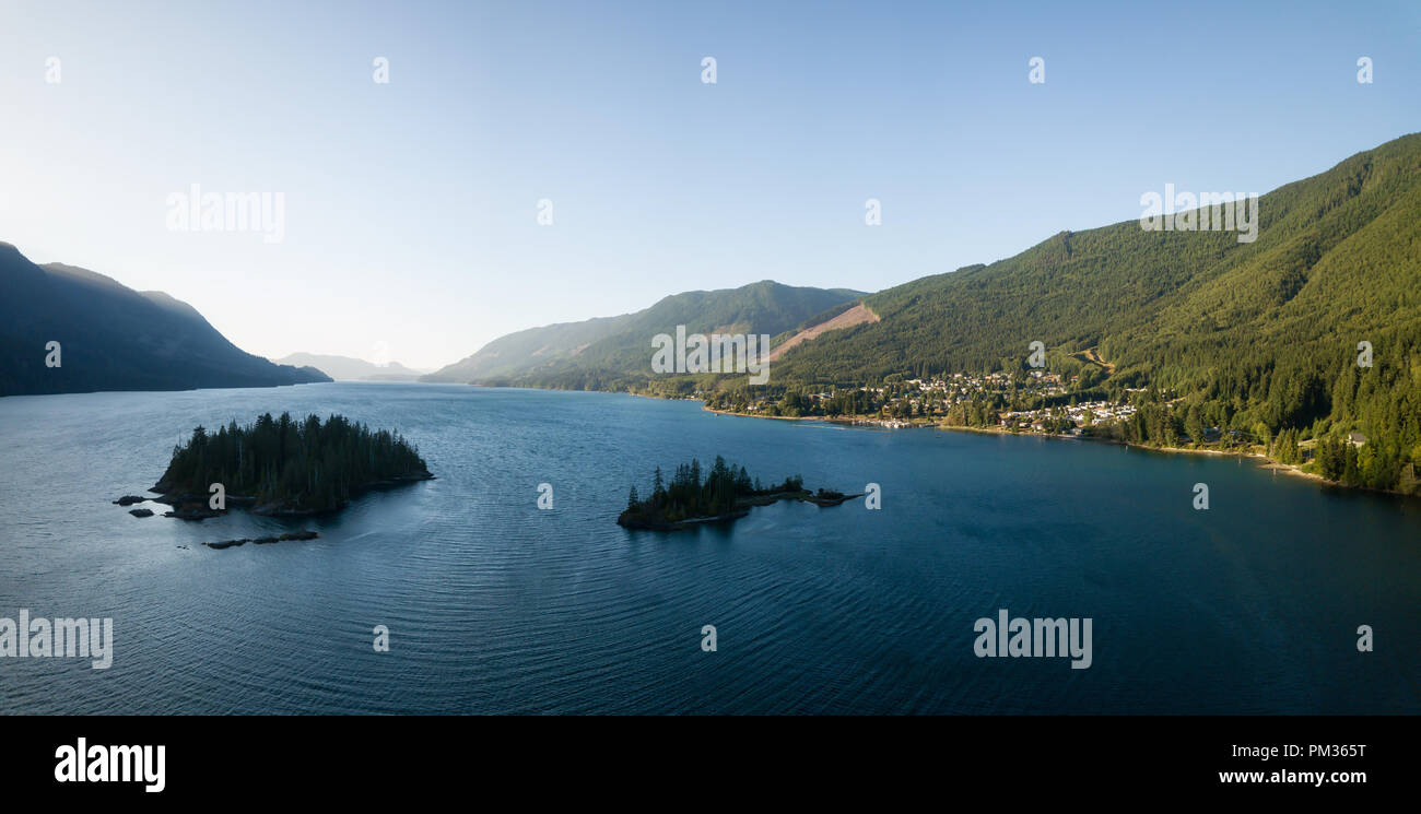 Aerial panoramic view of a small town, Port Alice, during a sunny ...
