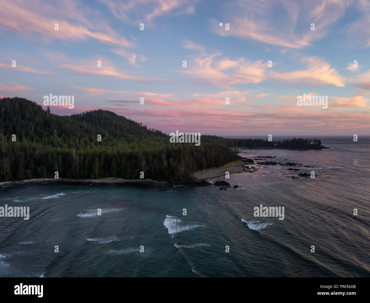 Aerial view of a beautiful beach on Pacific Ocean Coast druing a ...