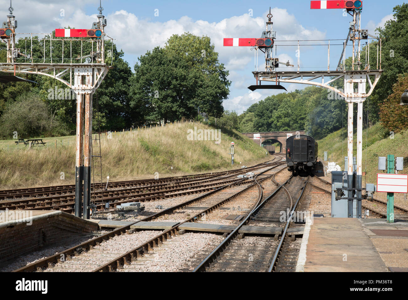 Steam Train leaving Staion; England; UK Stock Photo - Alamy