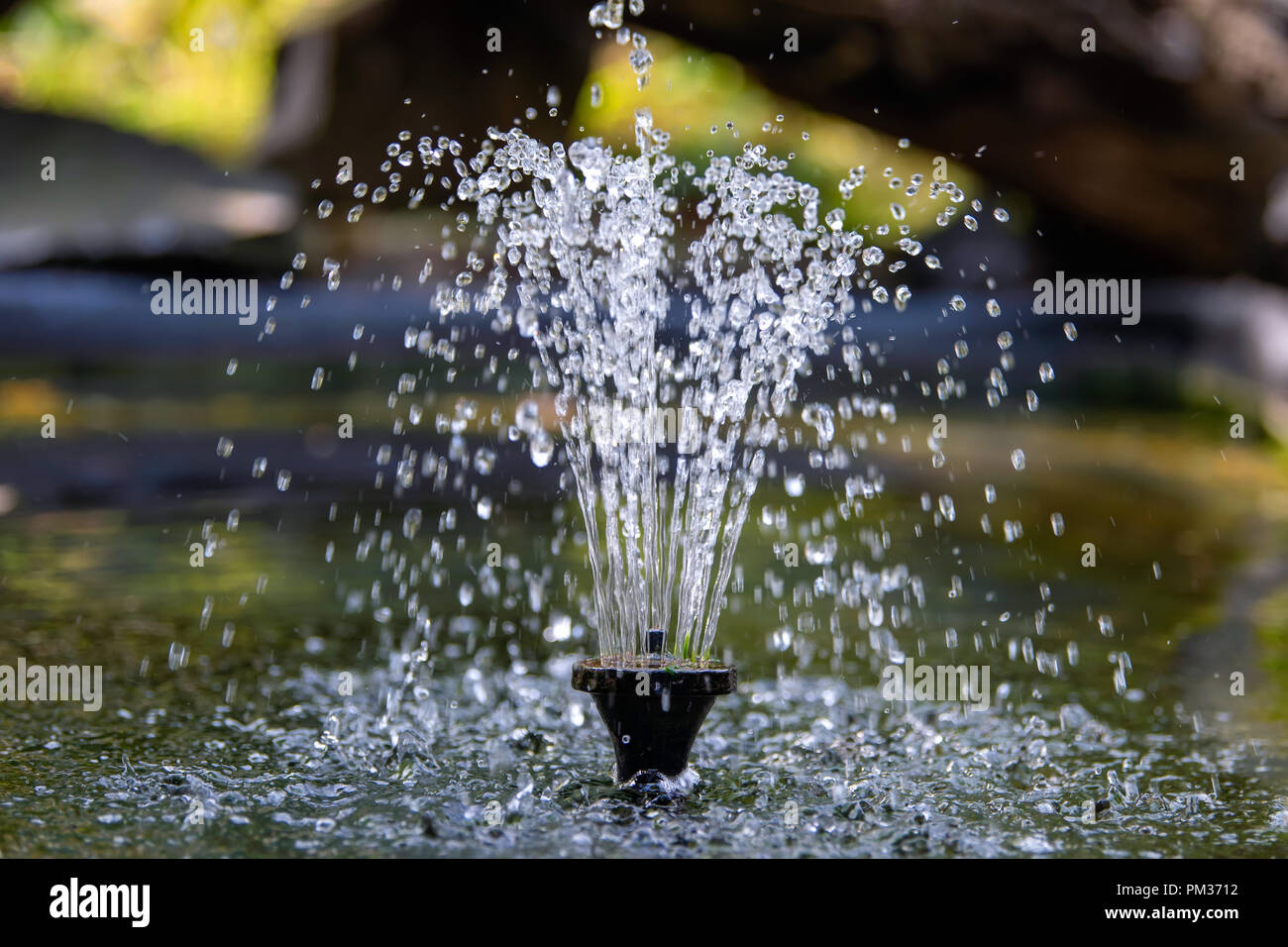Water small fountain garden summer hi-res stock photography and images ...