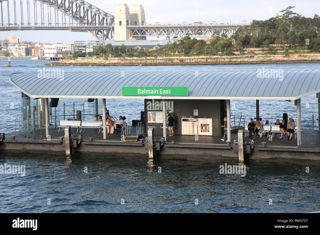 Balmain East ferry wharf with the Sydney Harbour Bridge in the ...