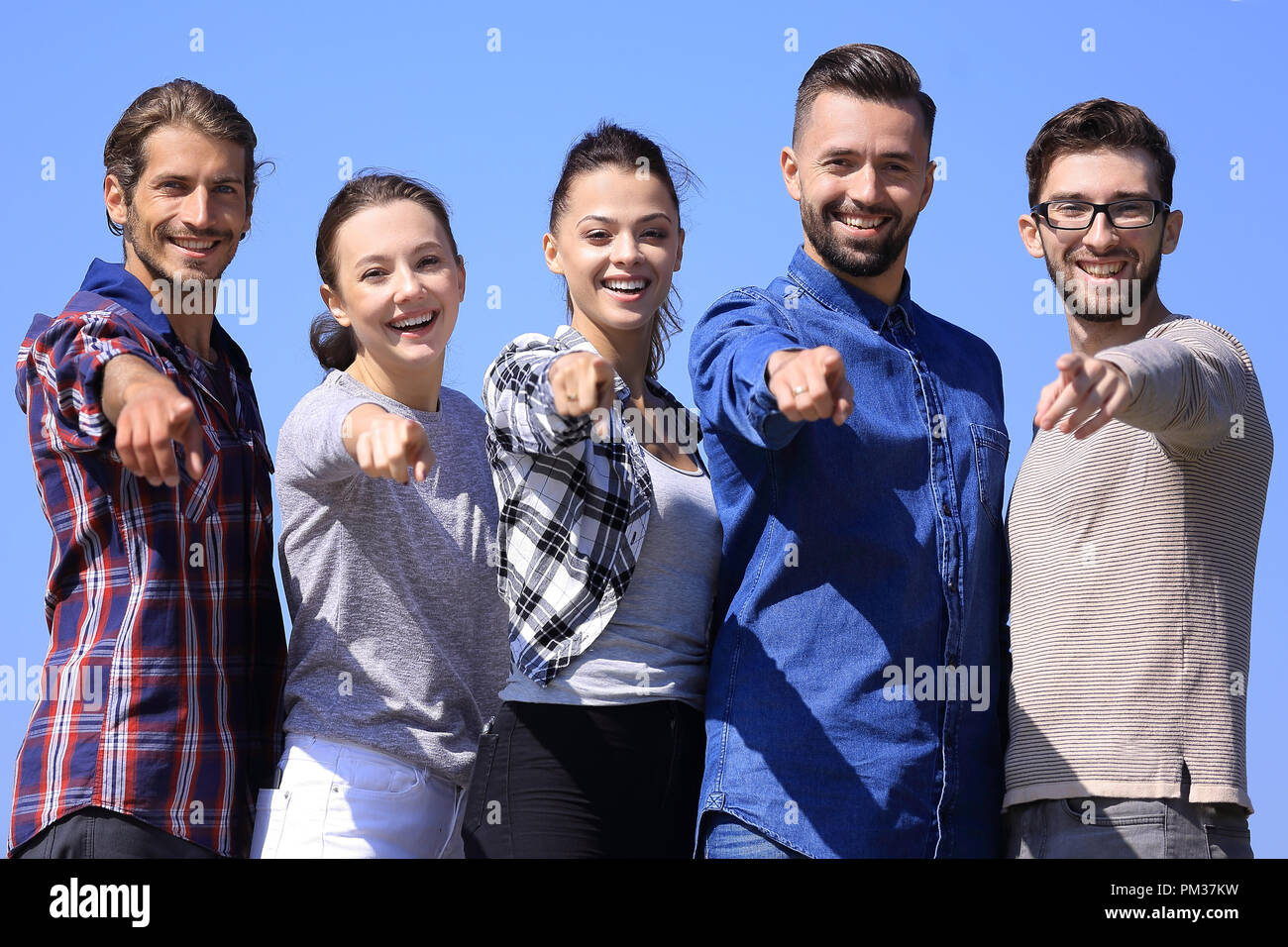 team of young people showing hands forward Stock Photo - Alamy