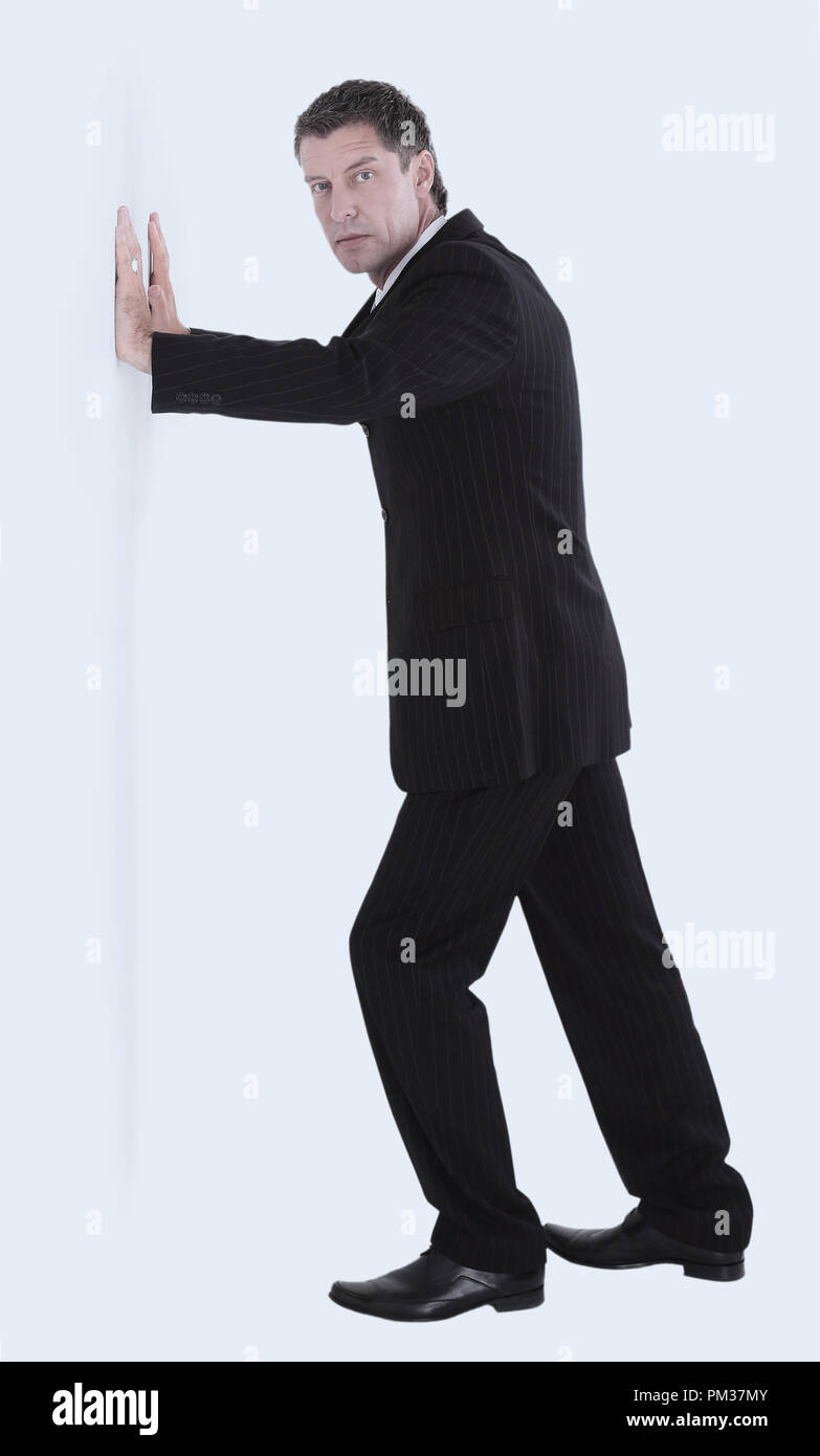 Side view of serious business man on white background Stock Photo - Alamy