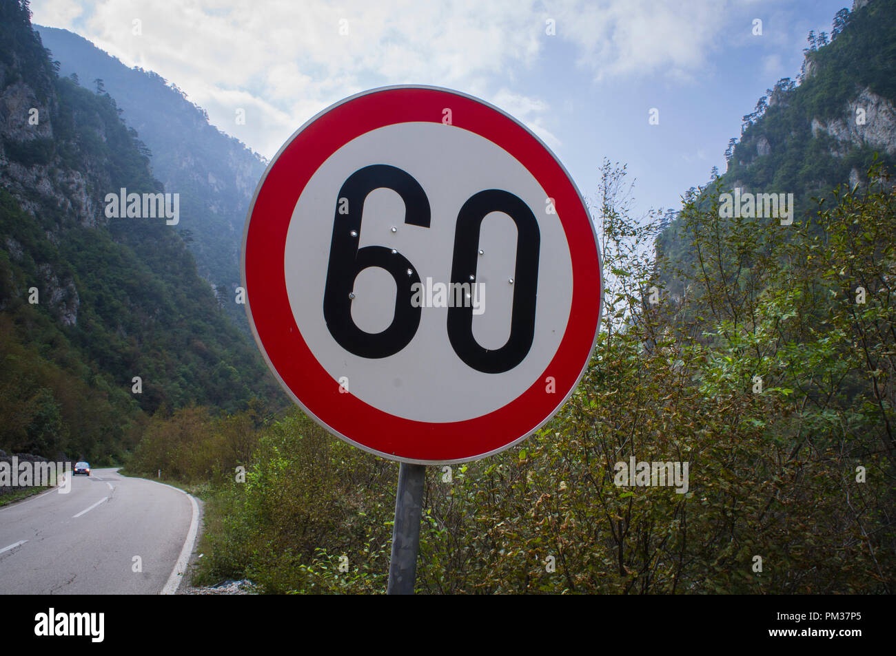 shot up prohibitory traffic/road speed limit sign, pierced, shoot ...