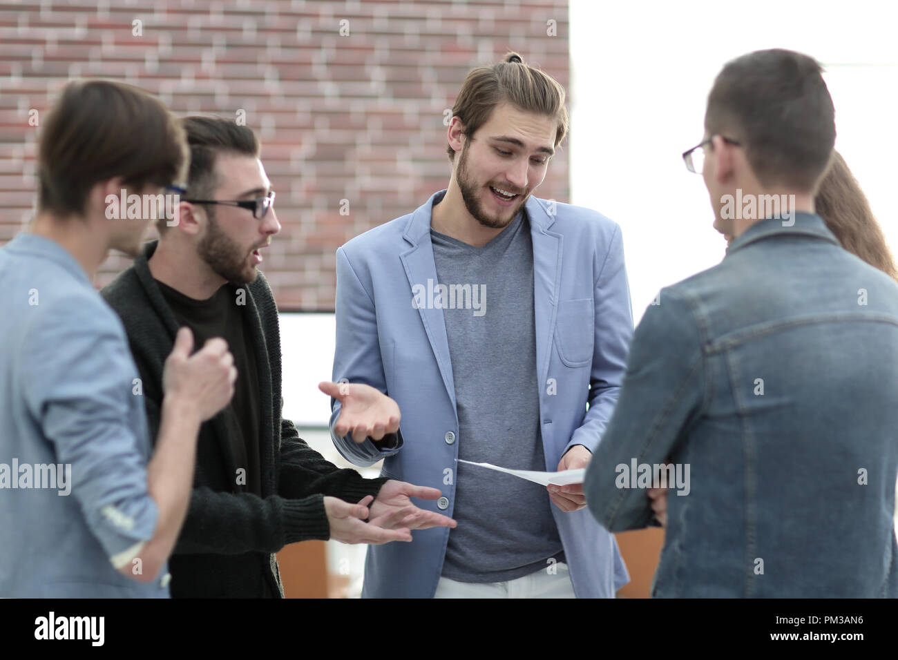 group of business people discussing issues Stock Photo - Alamy
