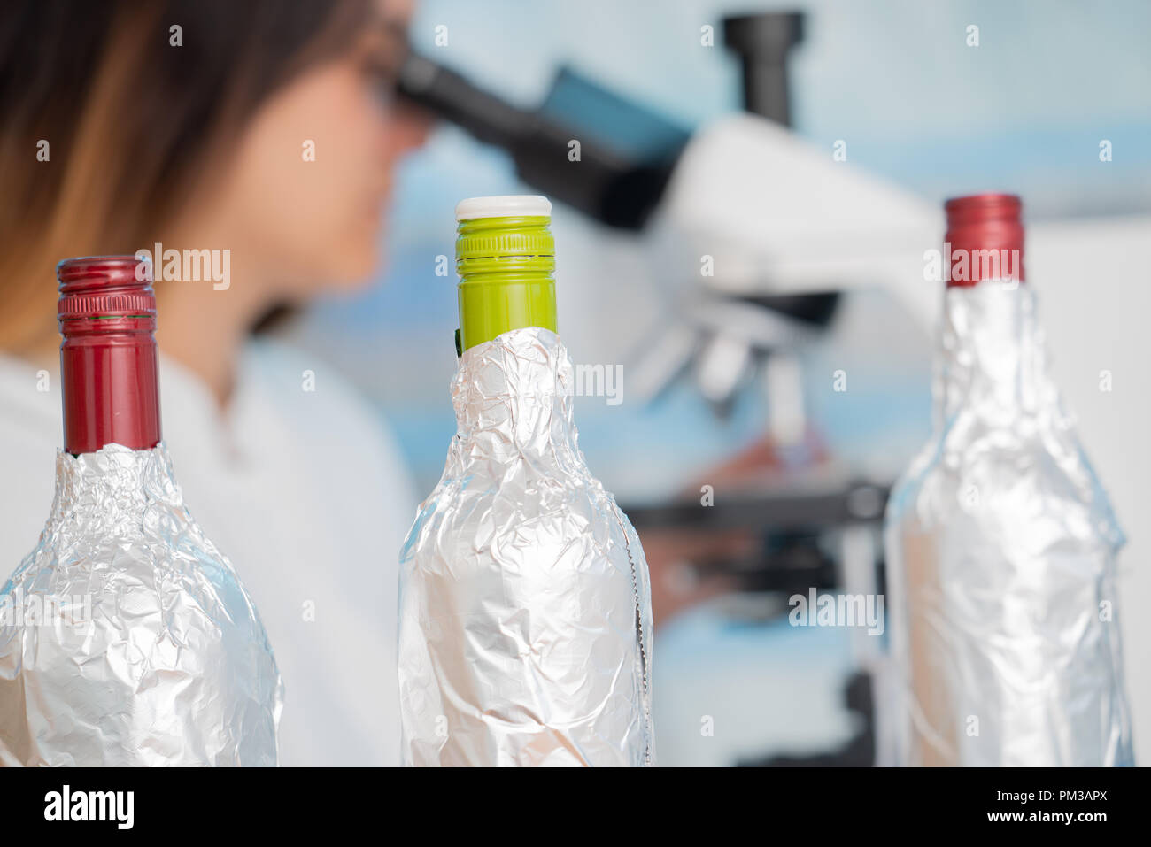 bottle of wine in the quality control laboratory Stock Photo - Alamy