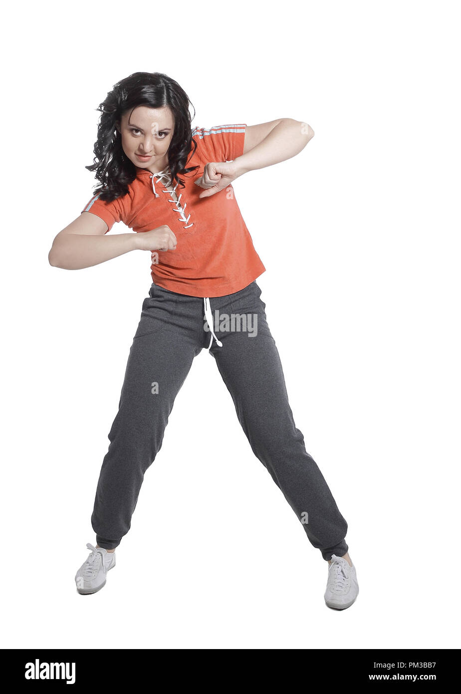 modern woman in a sports suit .isolated on white background Stock Photo ...