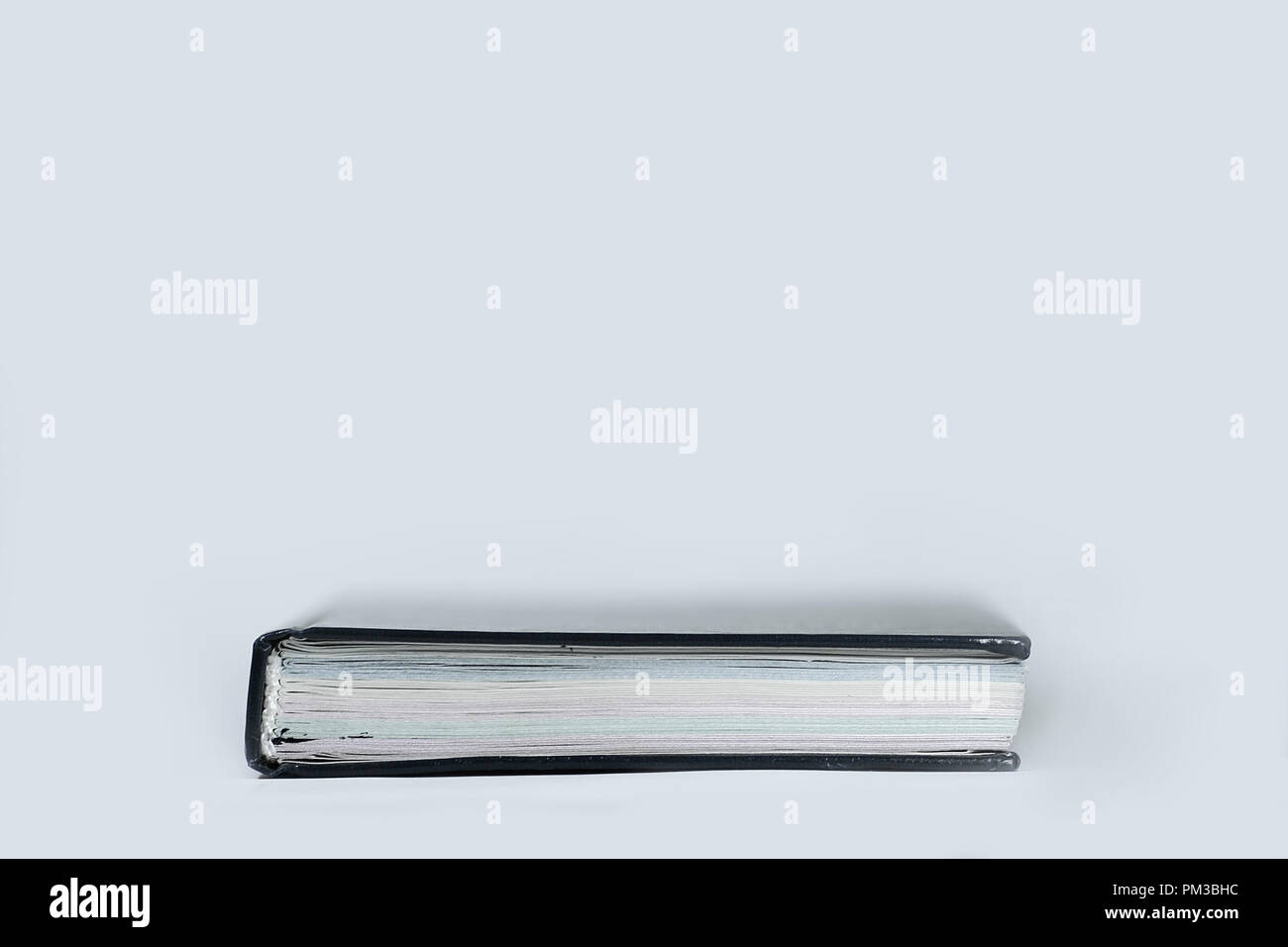 closed book in black cover.photo with copy space Stock Photo - Alamy