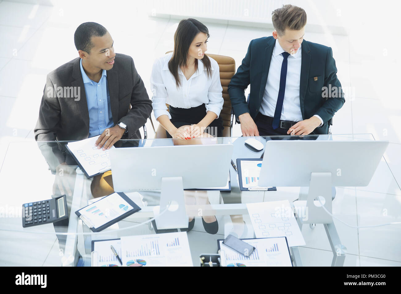 professional business team sitting at Desk in the office Stock Photo ...