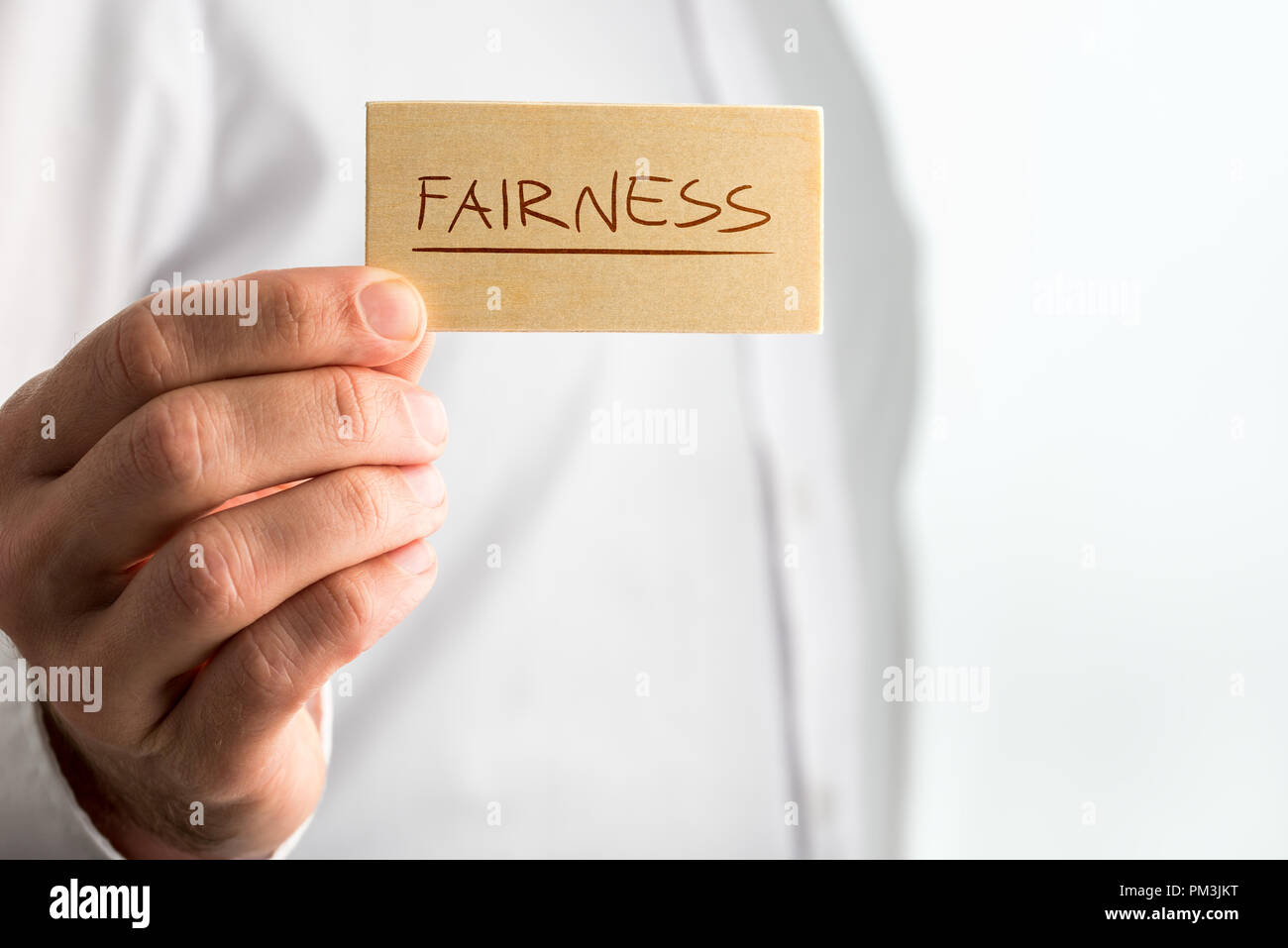 Fairness Concept Design- Close up Human Hand Holding Small Piece Wooden ...