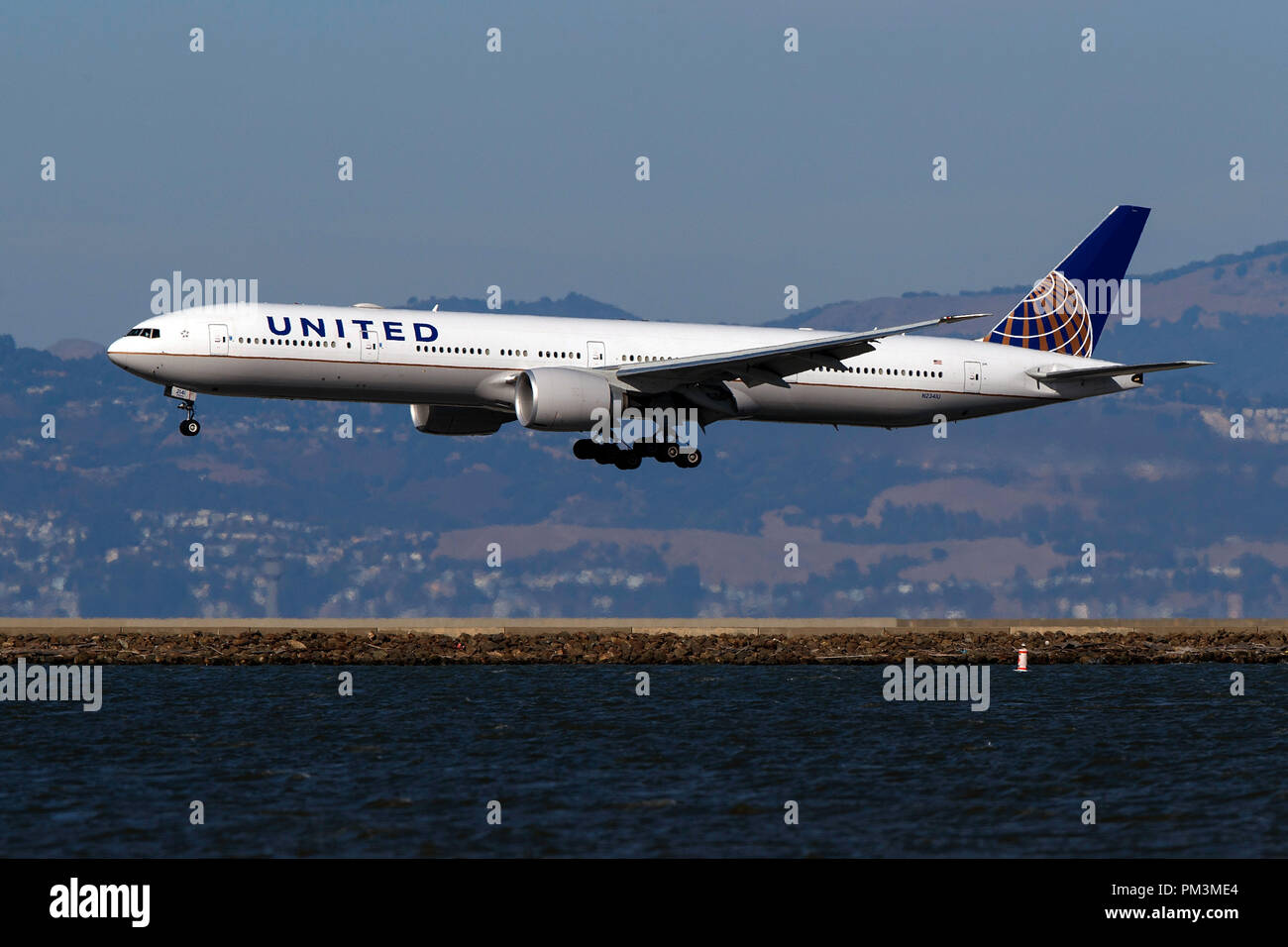 Boeing 777-322(ER) (N2341U) operated by United Airlines landing at San ...
