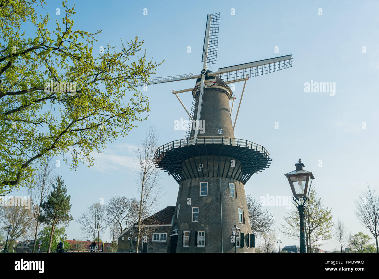 Molen De Valk windmill and cityscape at Leiden, Netherlands Stock Photo ...