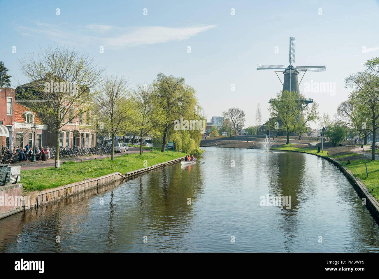 Molen De Valk windmill and cityscape at Leiden, Netherlands Stock Photo ...