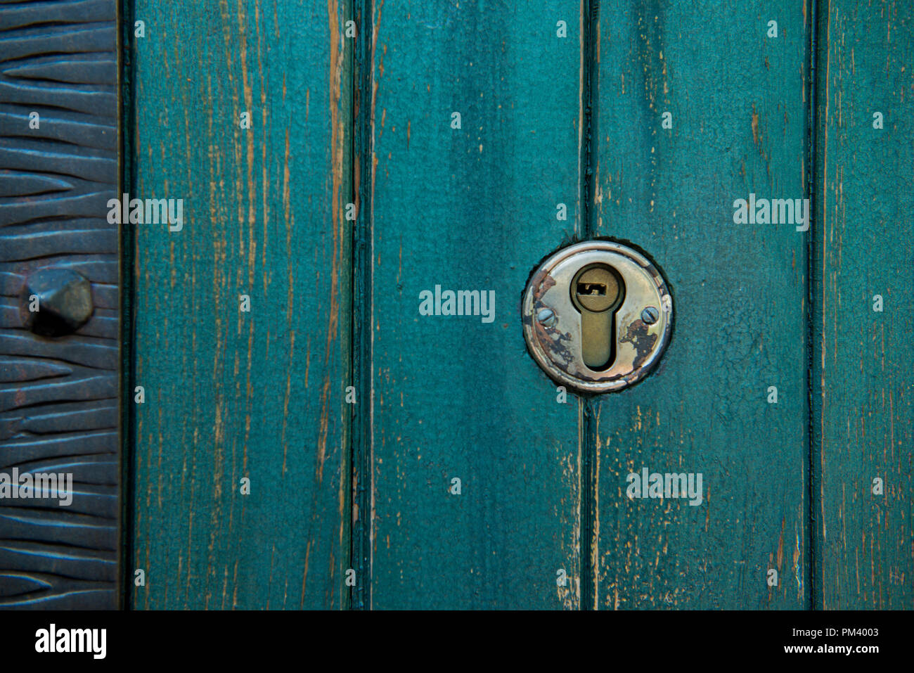 Old rusty and dusty keyhole wallpaper. Vintage keyhole on old wooden ...