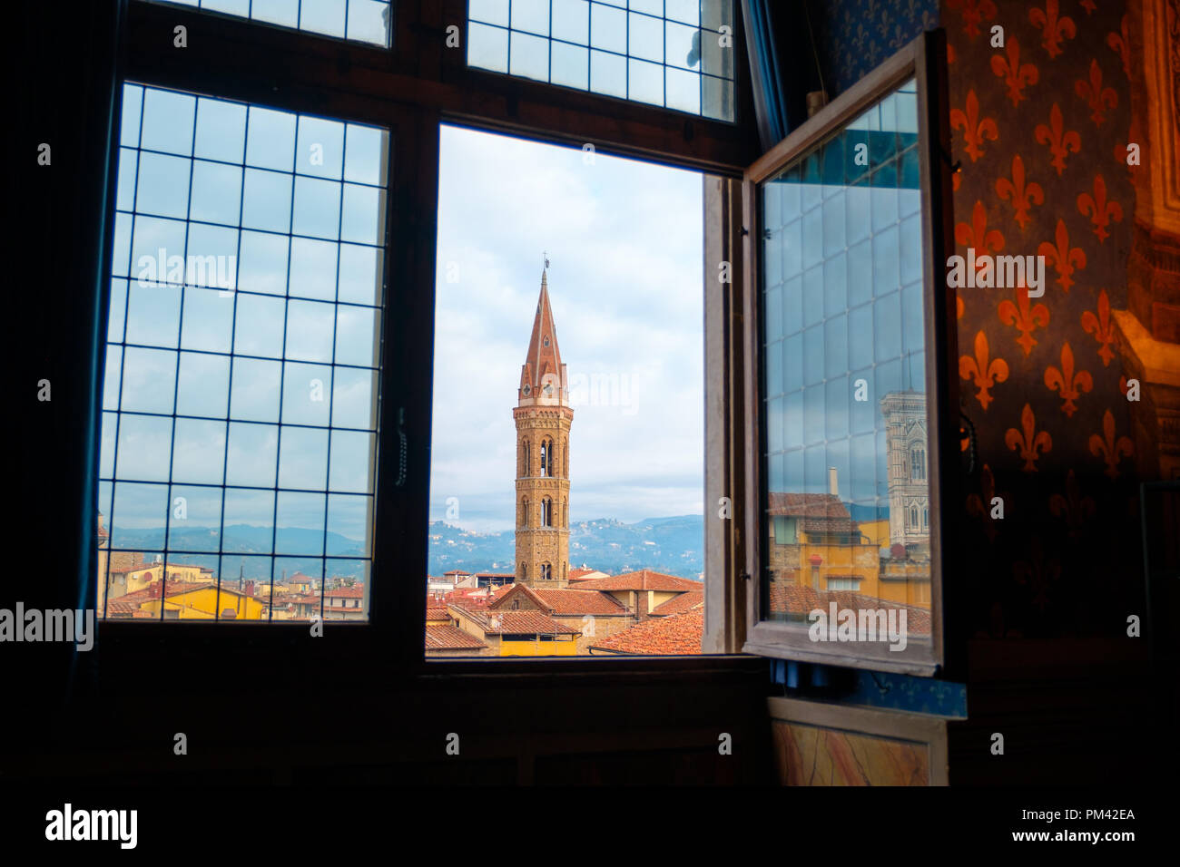 View of Florence through the window. View of La Cattedrale di Santa ...
