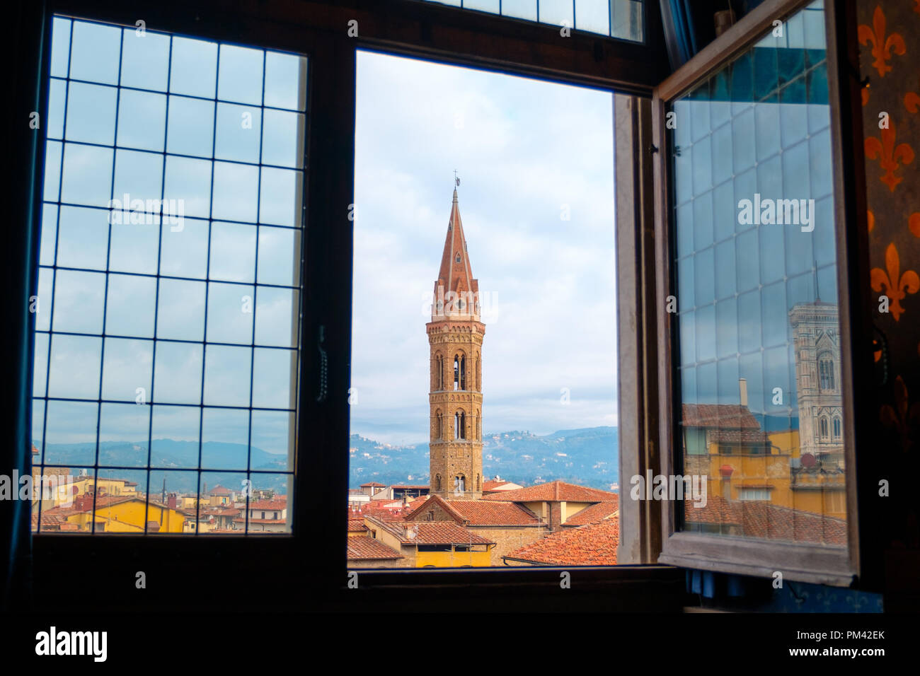 View of Florence through the window. View of La Cattedrale di Santa ...