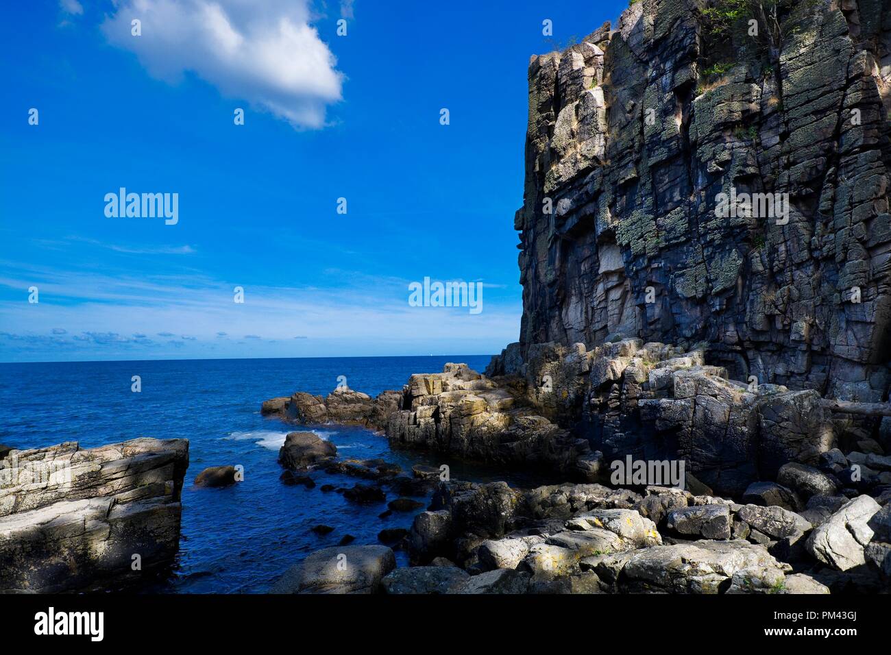 Sheer cliffs of the northern coast of Bornholm island ...