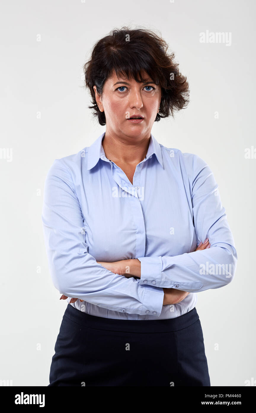 Portrait of a mature businesswoman with an expression of distrust Stock ...