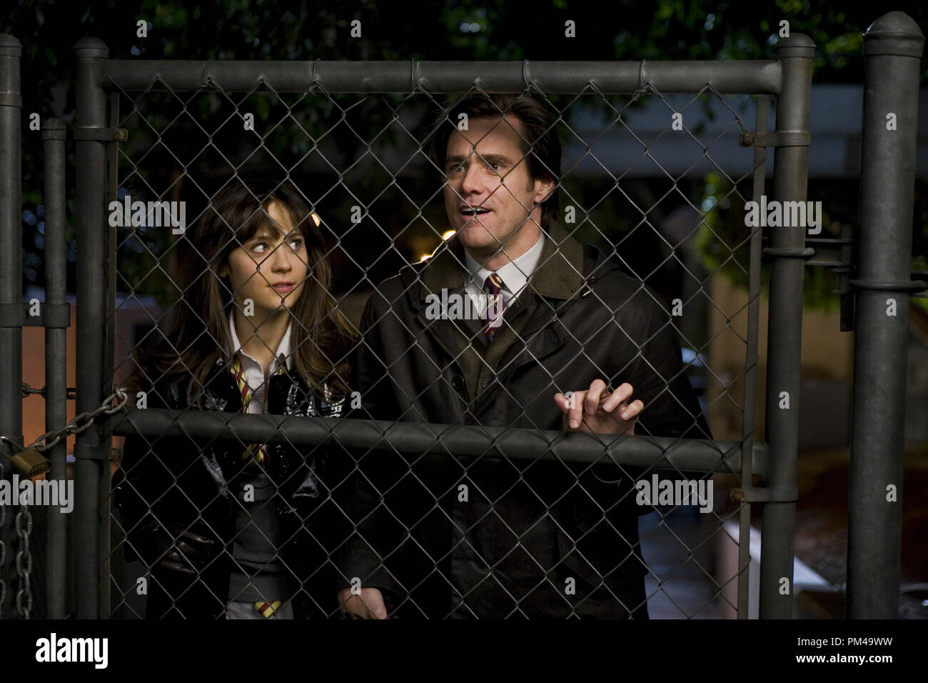 (L-r) Allison (ZOOEY DESCHANEL) and Carl (JIM CARREY) consider climbing ...