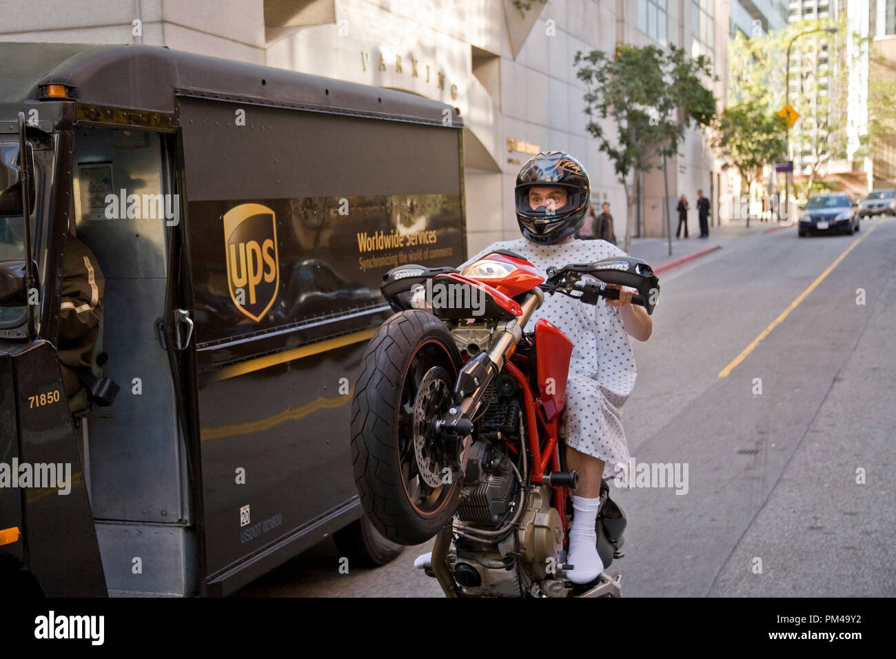 Carl (JIM CARREY) pops a wheelie in Warner Bros. Pictures' and Village ...
