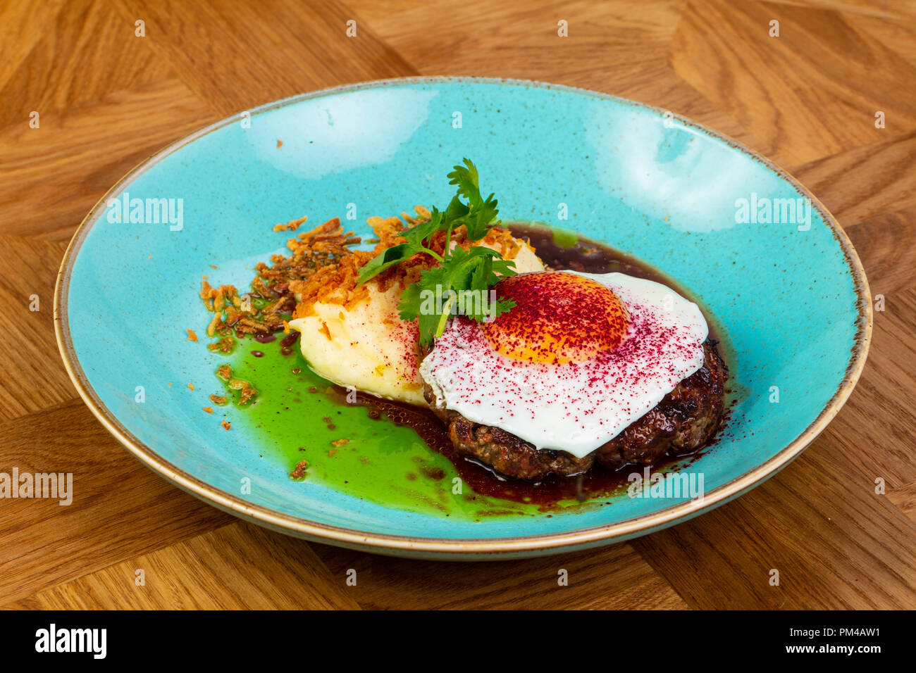 Roasted beefsteak with egg and mushed potato Stock Photo - Alamy