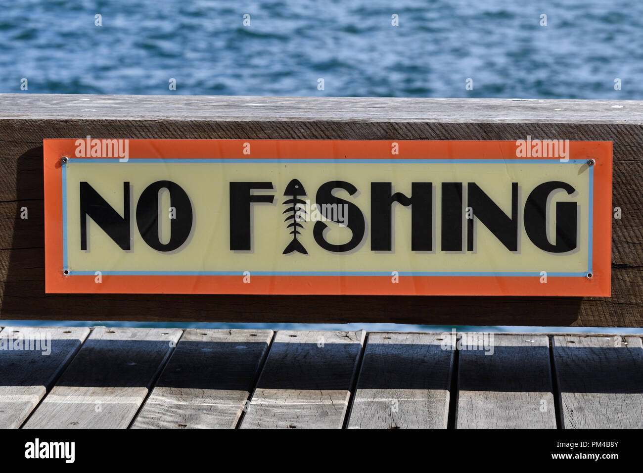 No Fishing Sign On Boardwalk Stock Photo - Alamy