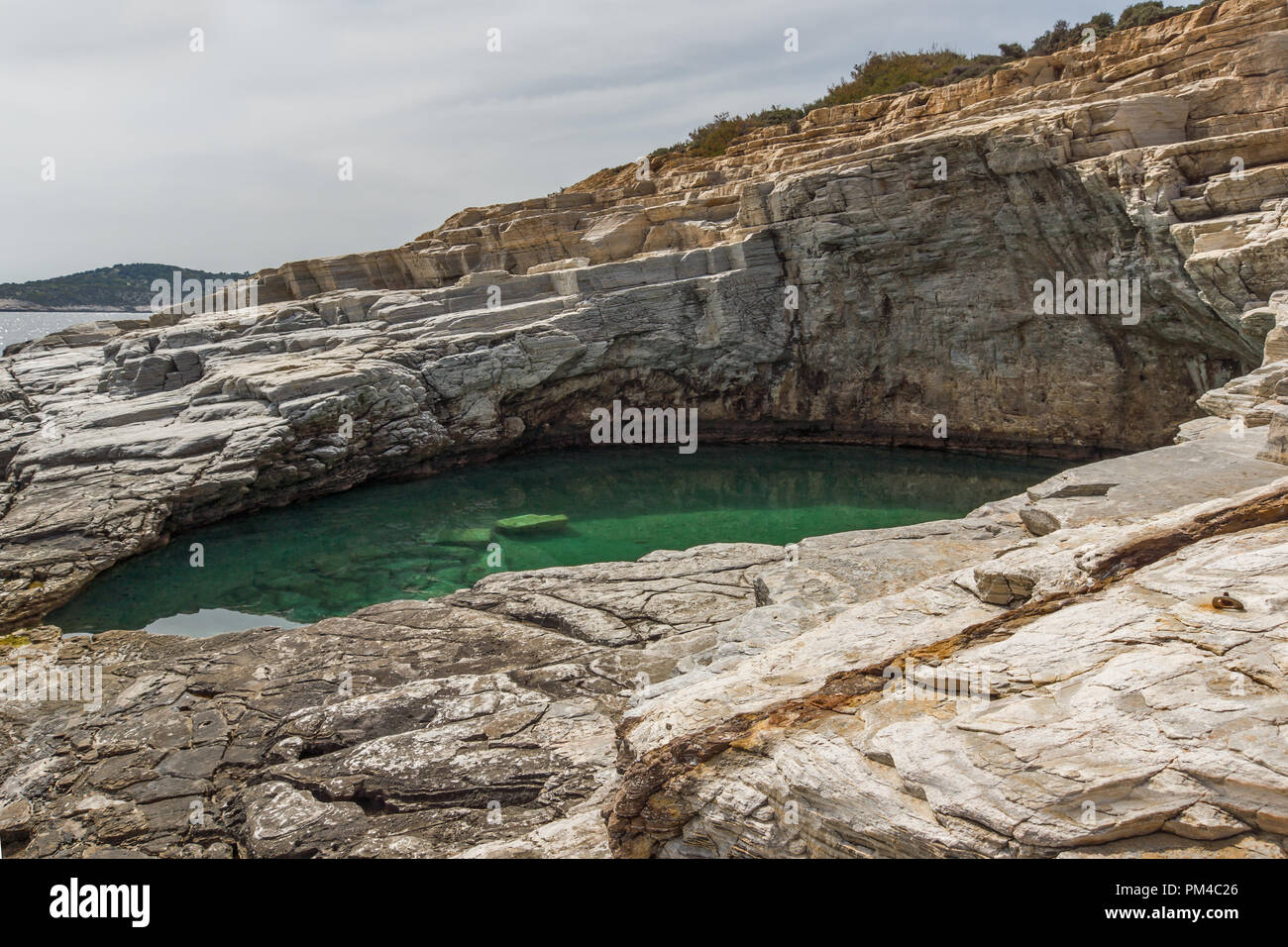 Green waters of Giola Natural Pool in Thassos island, East Macedonia ...