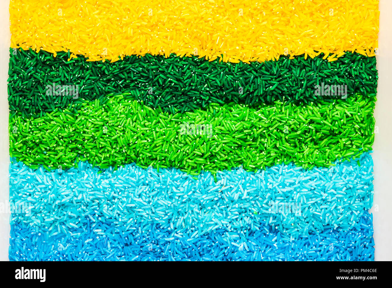 Horizontal lines with colorful rice grain Stock Photo - Alamy