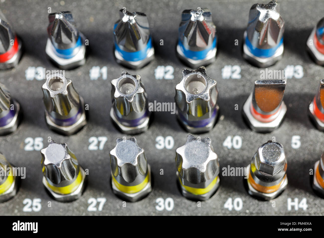 Various fastener bits in a box close-up Stock Photo - Alamy
