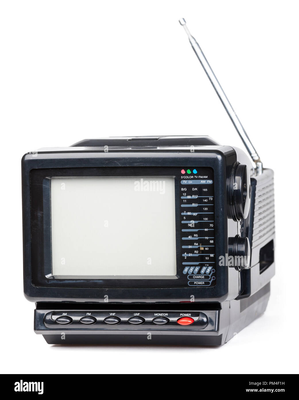 Vintage small portable color TV set with radio on white background ...