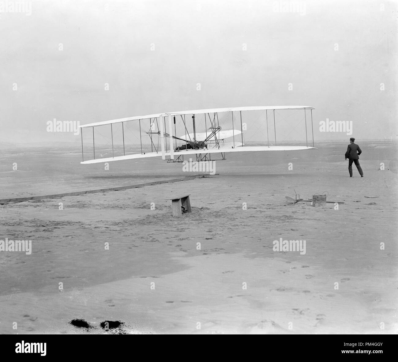 Orville wright at the controls of the machine hi-res stock photography ...