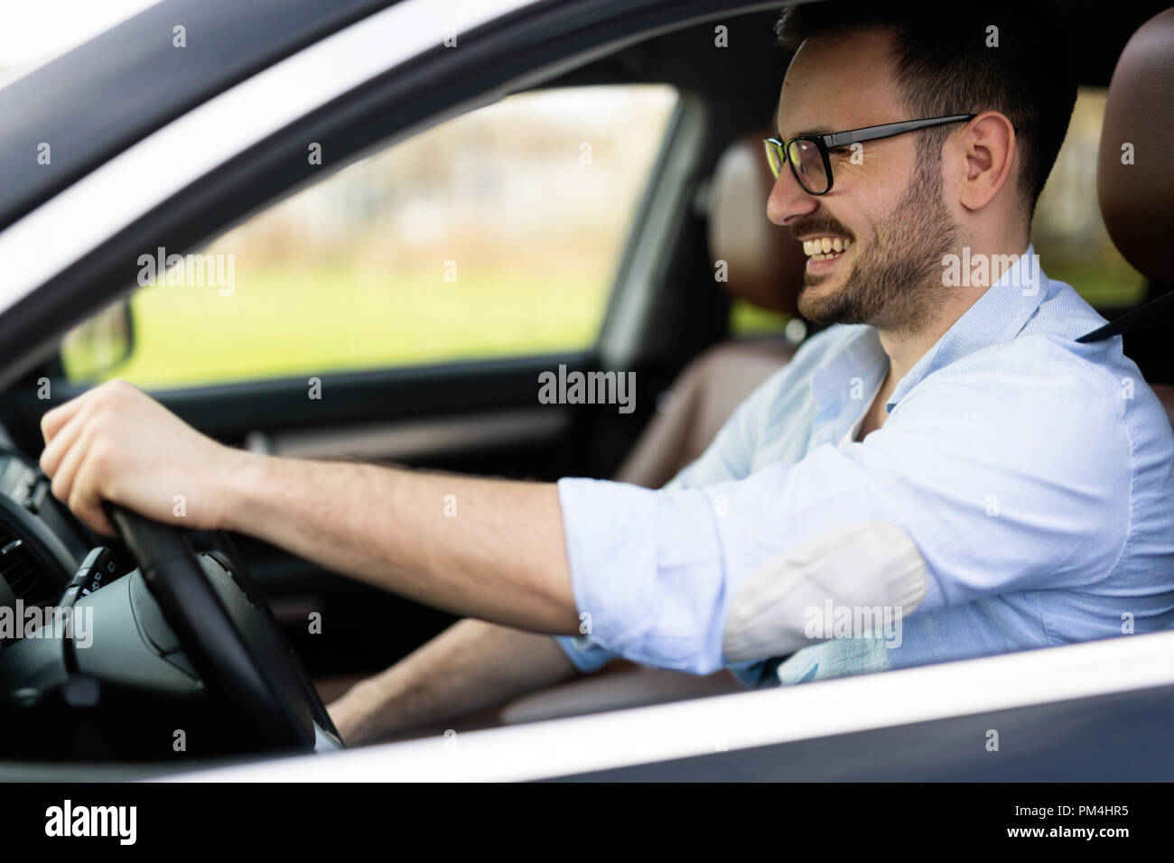 Young man driving sports car hi-res stock photography and images - Alamy