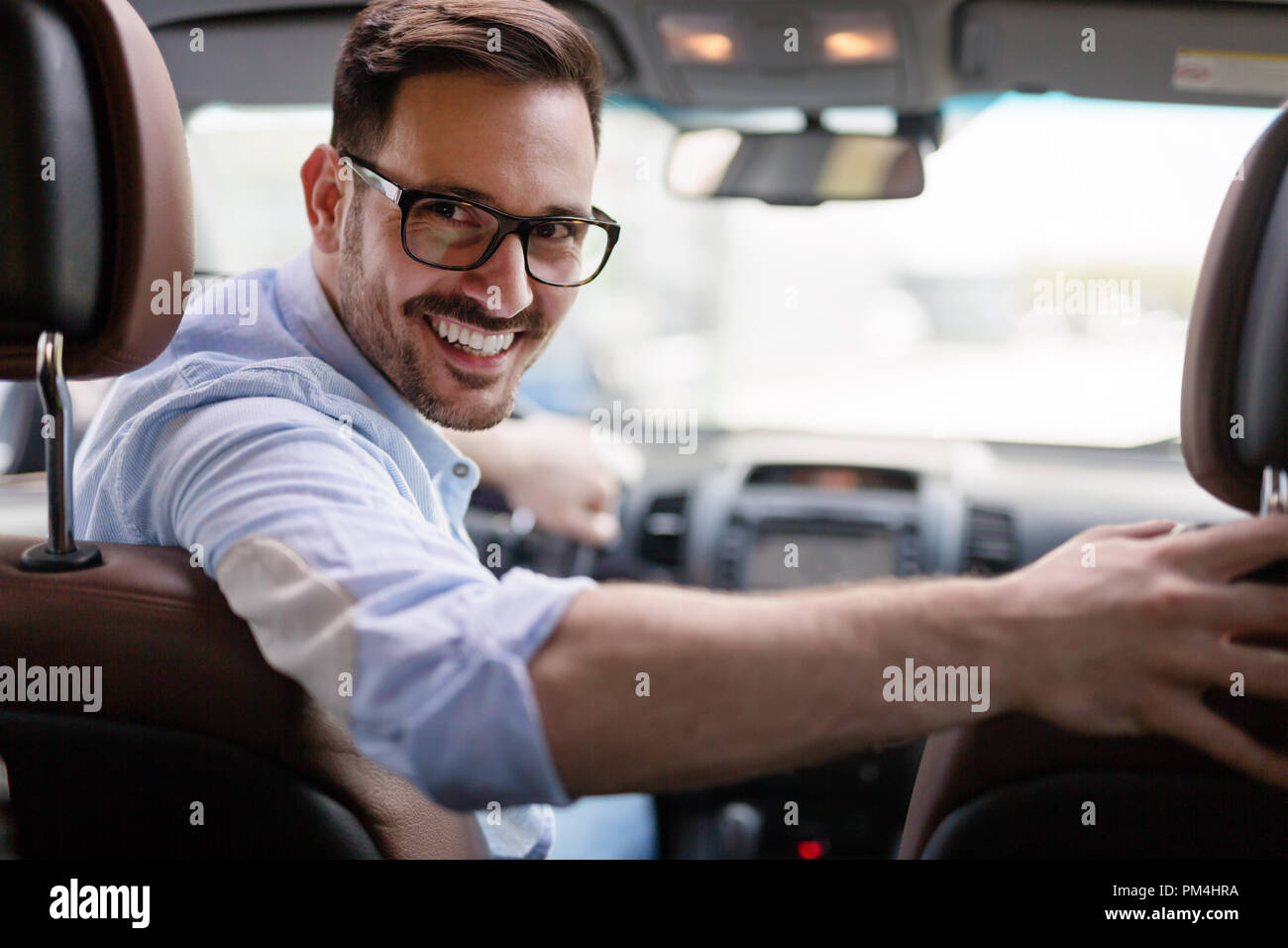 Young man driving sports car hi-res stock photography and images - Alamy