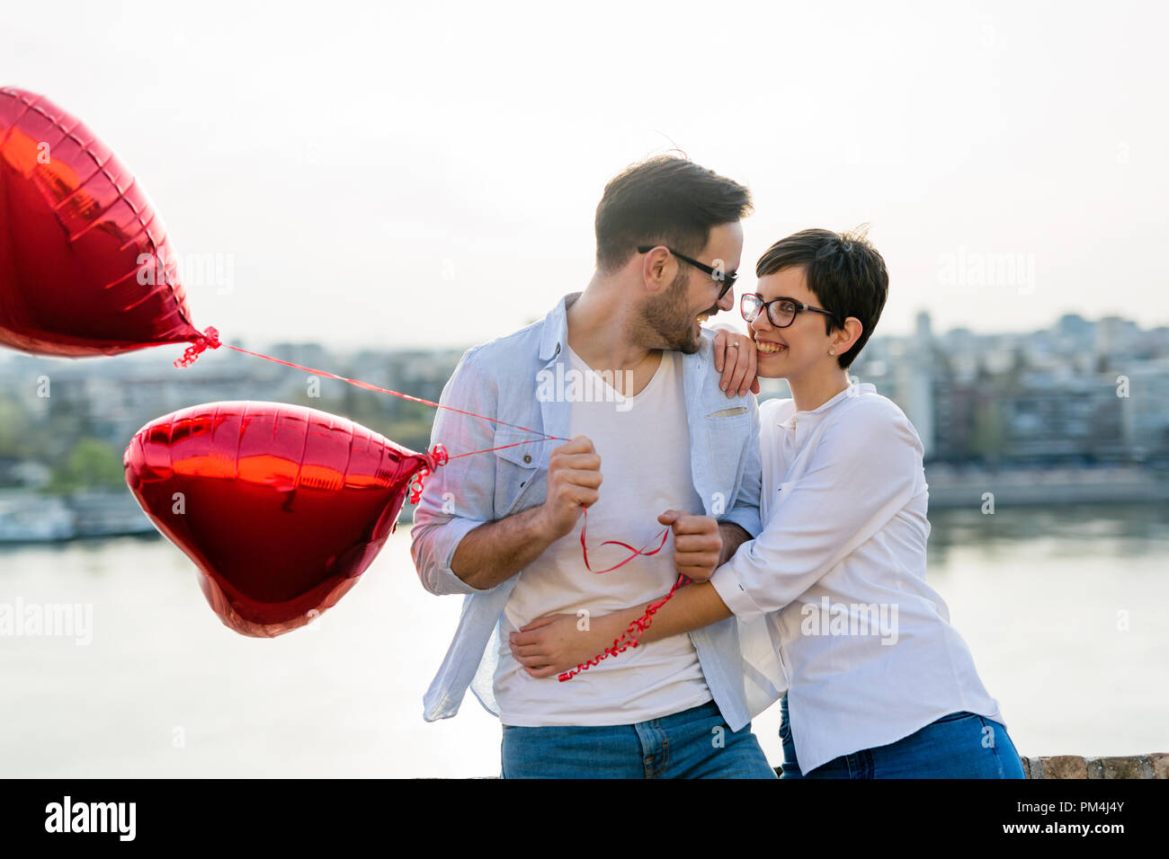 Sentimental couple in love bonding Stock Photo - Alamy