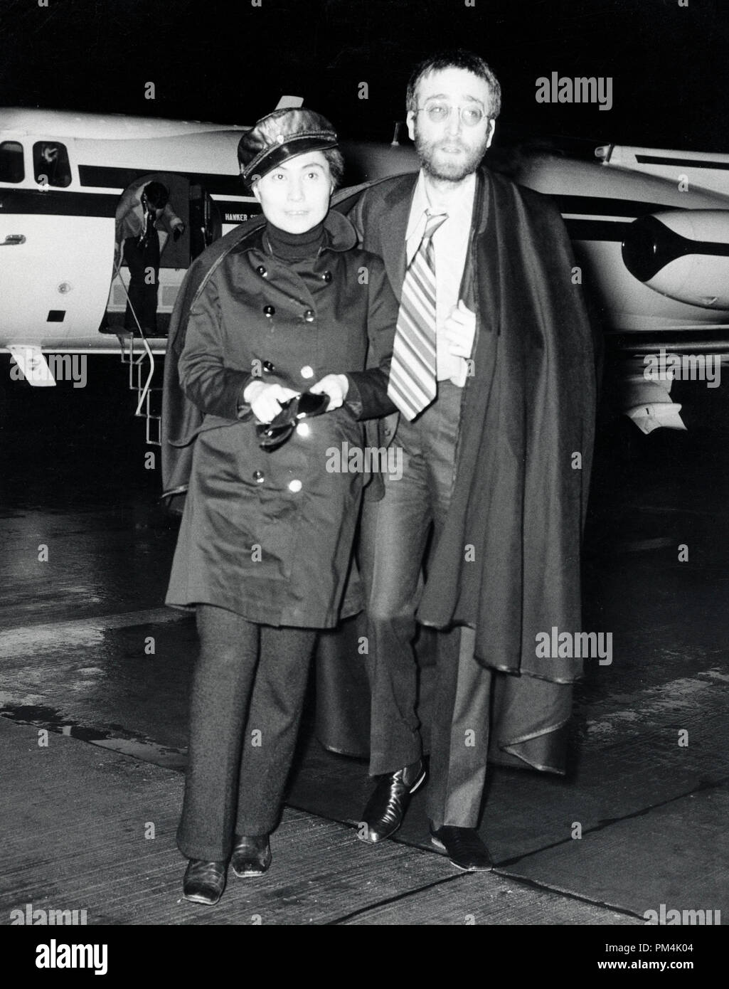 Beatle John Lennon with wife Yoko Ono, arriving at airport,1970. File Reference #1013 117 THA ...