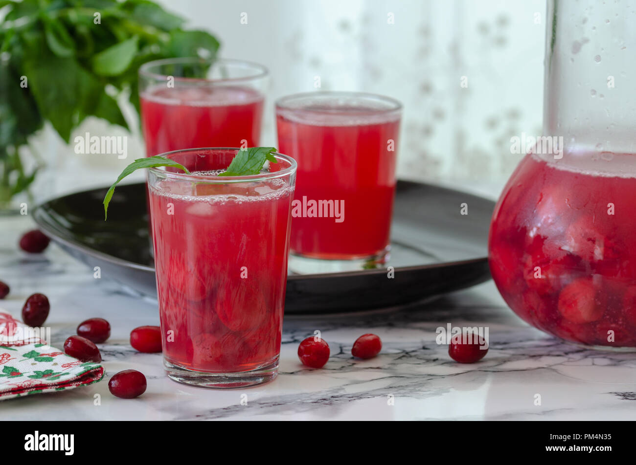Fresh cranberry drink on marble background.Ready to serve Stock Photo ...