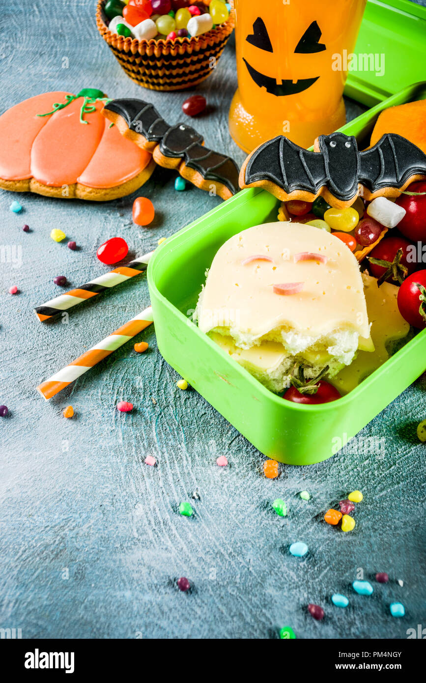 Halloween food, school lunch box with ghost sandwich, carved little ...