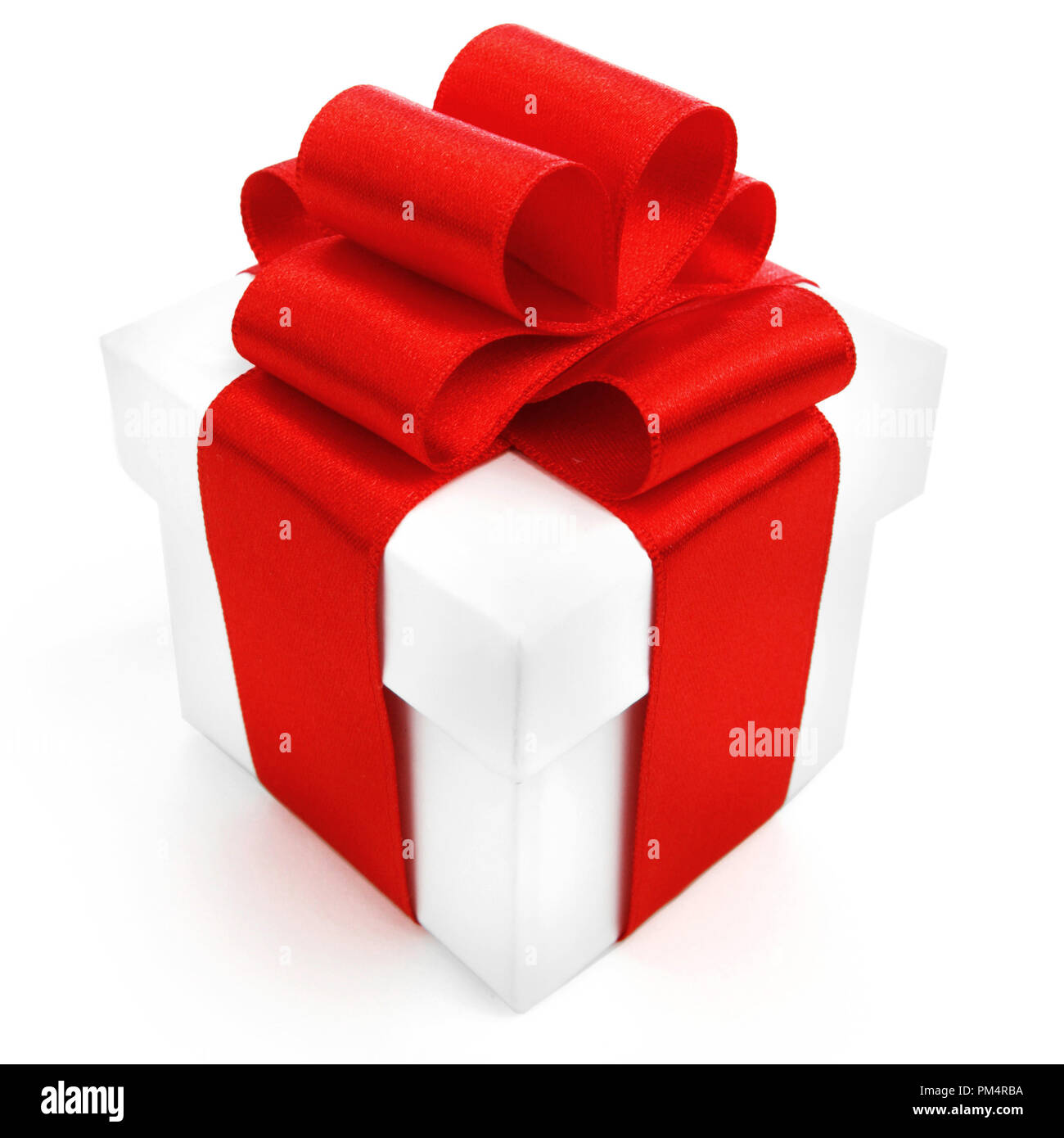 White gift box with red ribbon isolated on white background Stock Photo ...