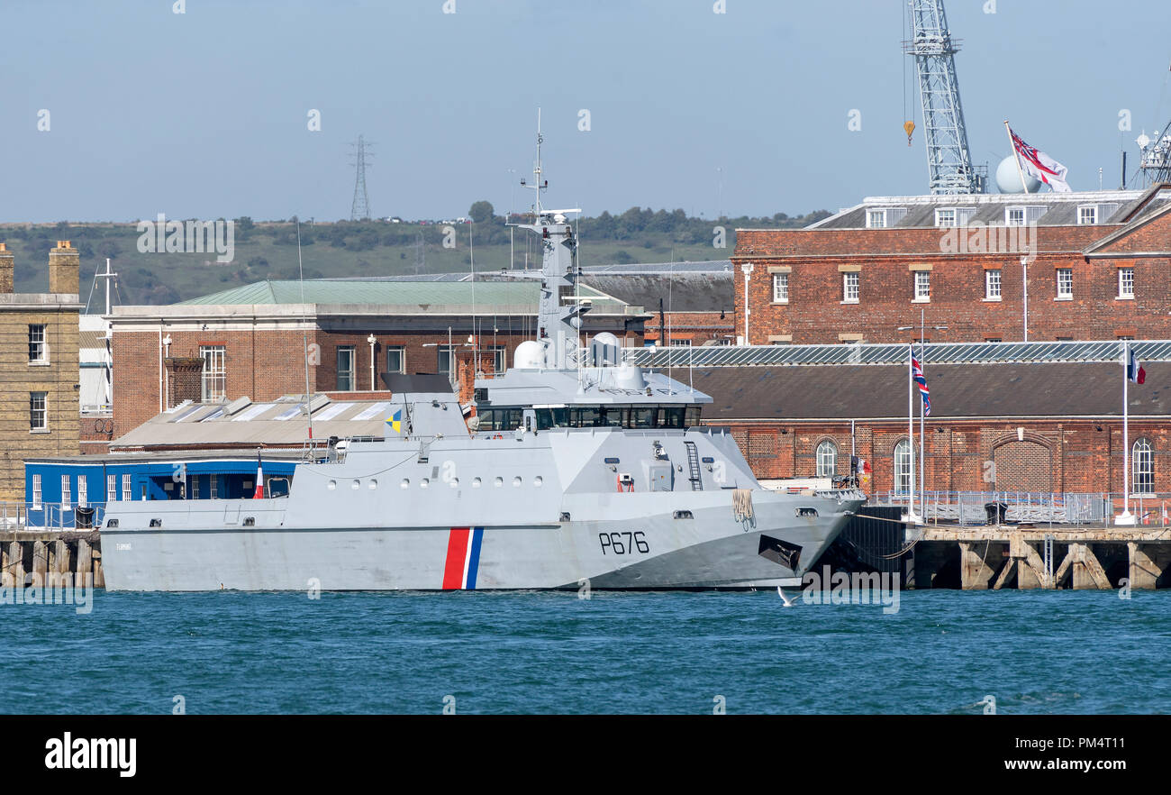 French navy vessel P676 Flamant. A search and rescue and fisheries patrol boat alongside in ...