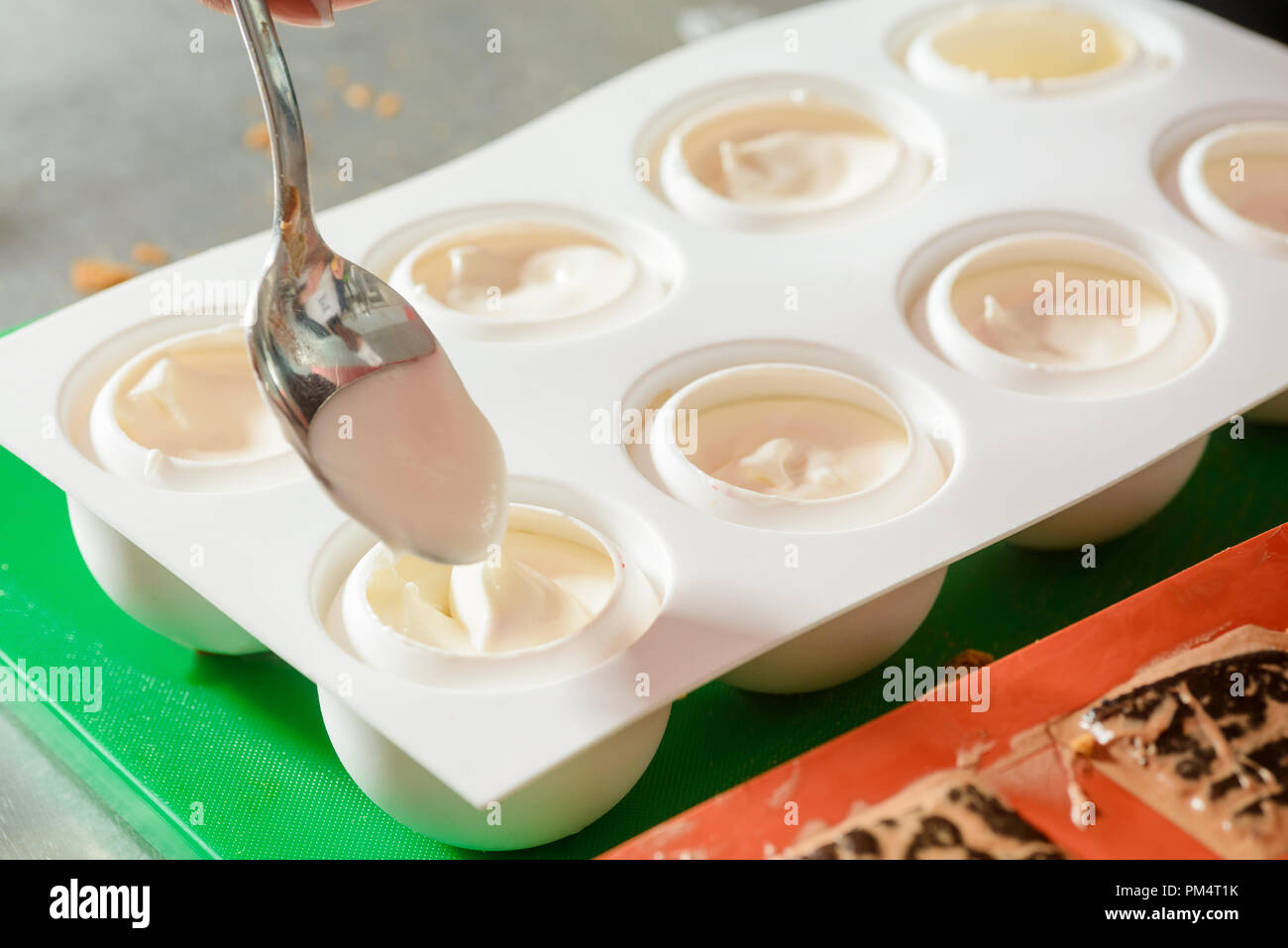 Spoon of mousse Stock Photo - Alamy