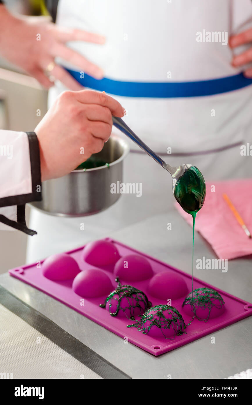 Long strand of caramel Stock Photo - Alamy