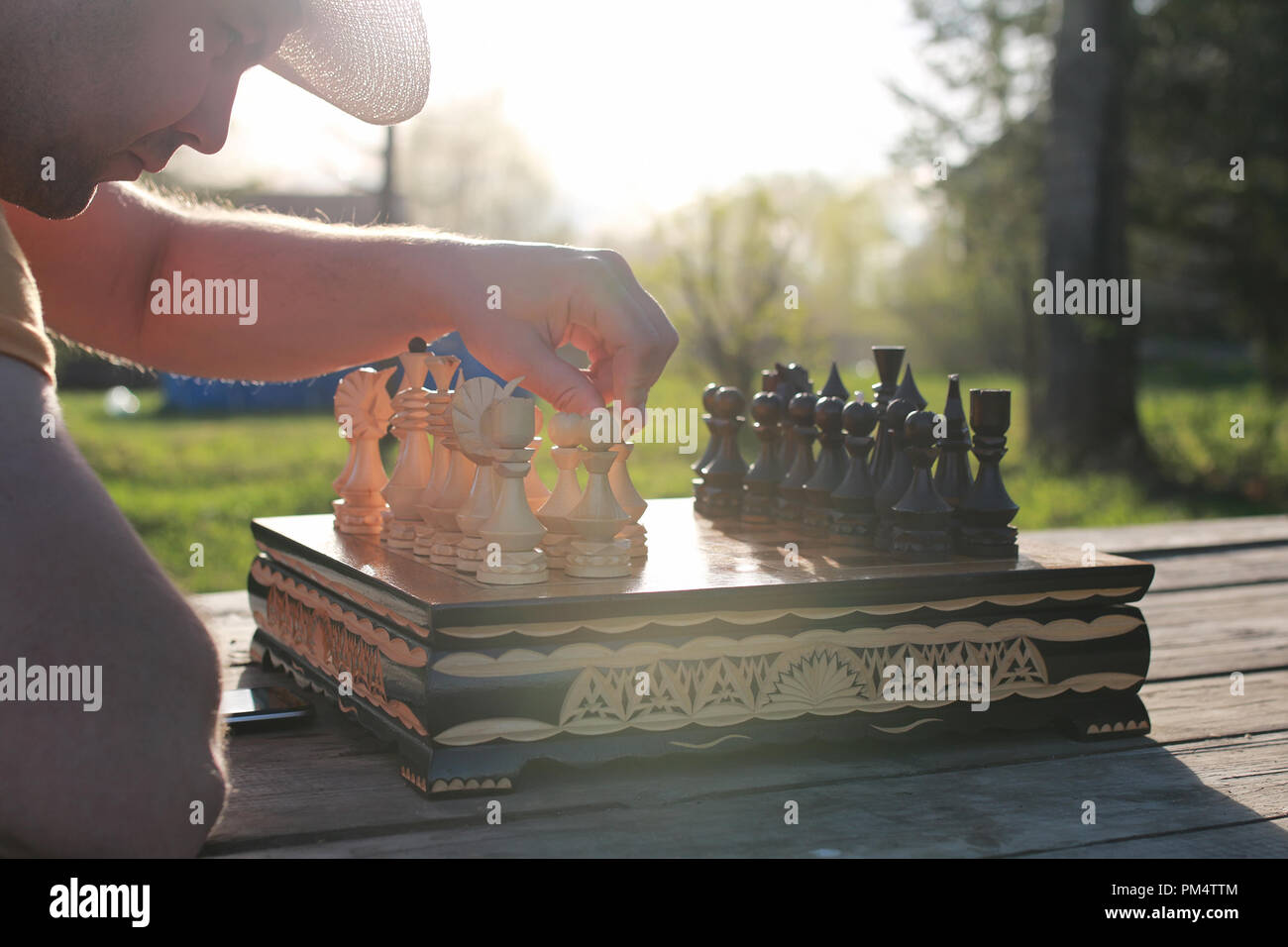 chess man hand outdoor Stock Photo - Alamy