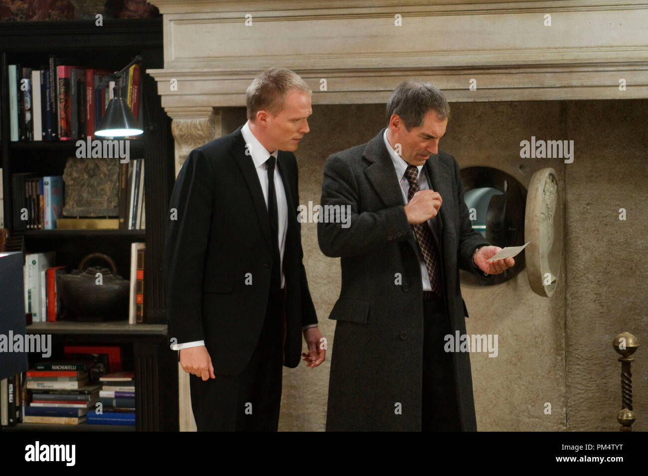 Paul Bettany as Interpol Agent "Acheson" and Timothy Dalton as Interpol ...
