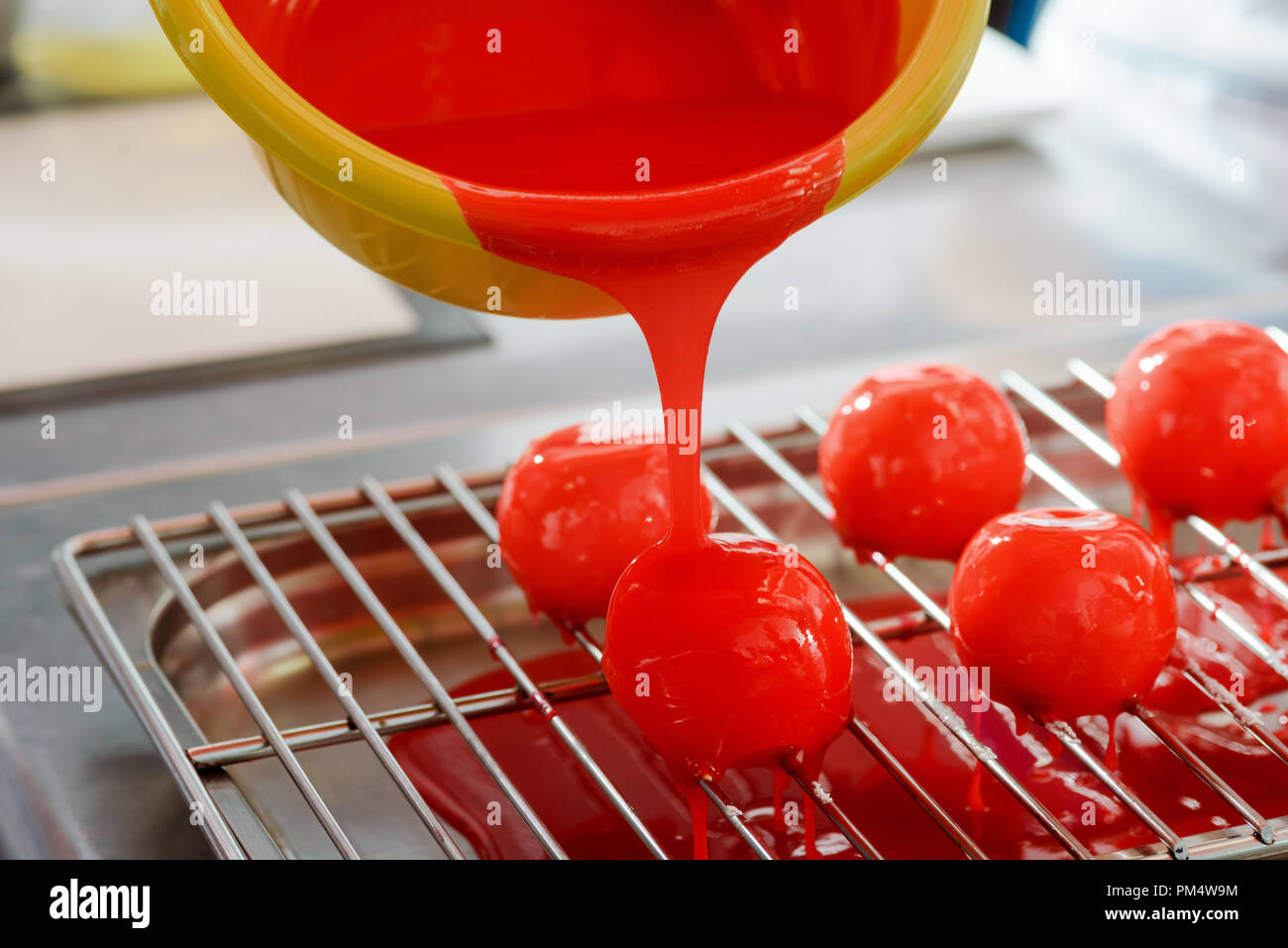 Delicious syrup for mousse cakes Stock Photo - Alamy